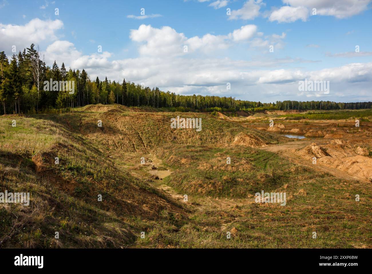 Landscape of an overgrown sand quarry after mining Stock Photo - Alamy