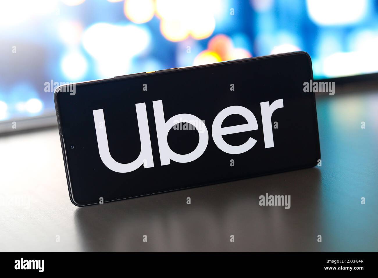 In this photo illustration, the Uber Technologies Inc. logo is displayed on a smartphone screen ...