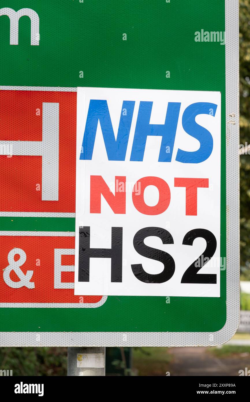 A413 Stoke Mandeville roadside sign for Stoke Mandeville Hospital and Stadium with anti HS2 sign ...