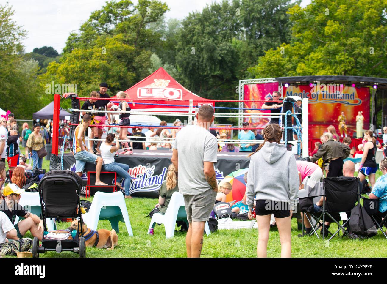 Spectators watching Thai boxing, children boxing, Magic of Thailand ...