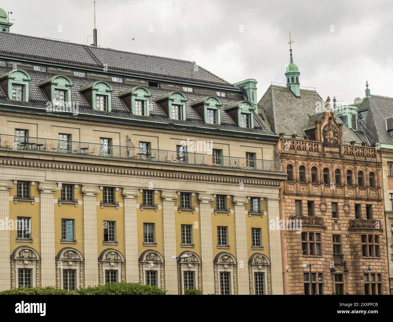 Colourful historic buildings with different roof styles and many ...