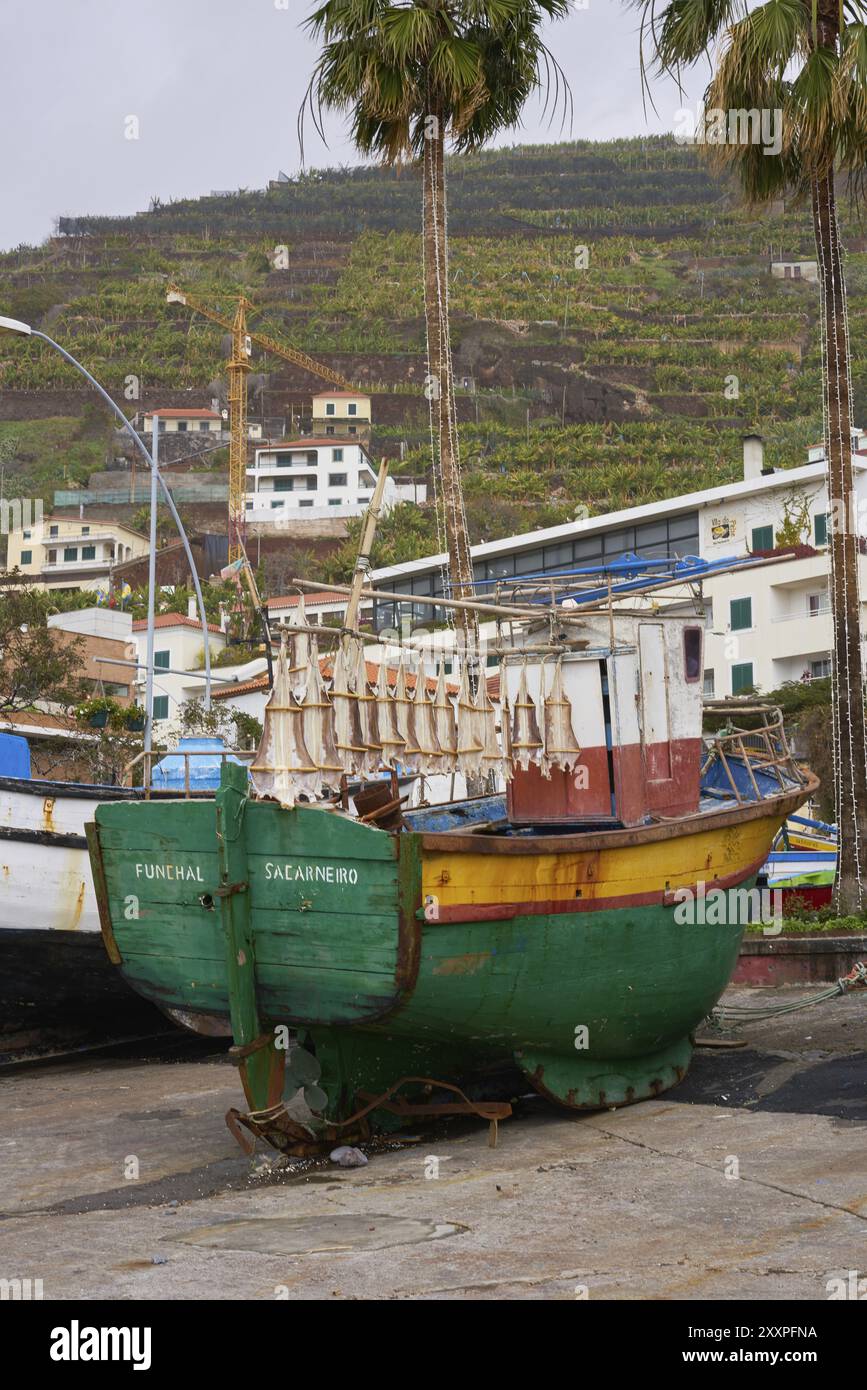 Fishing boat Sa Carneiro with codfish drying Stock Photo - Alamy