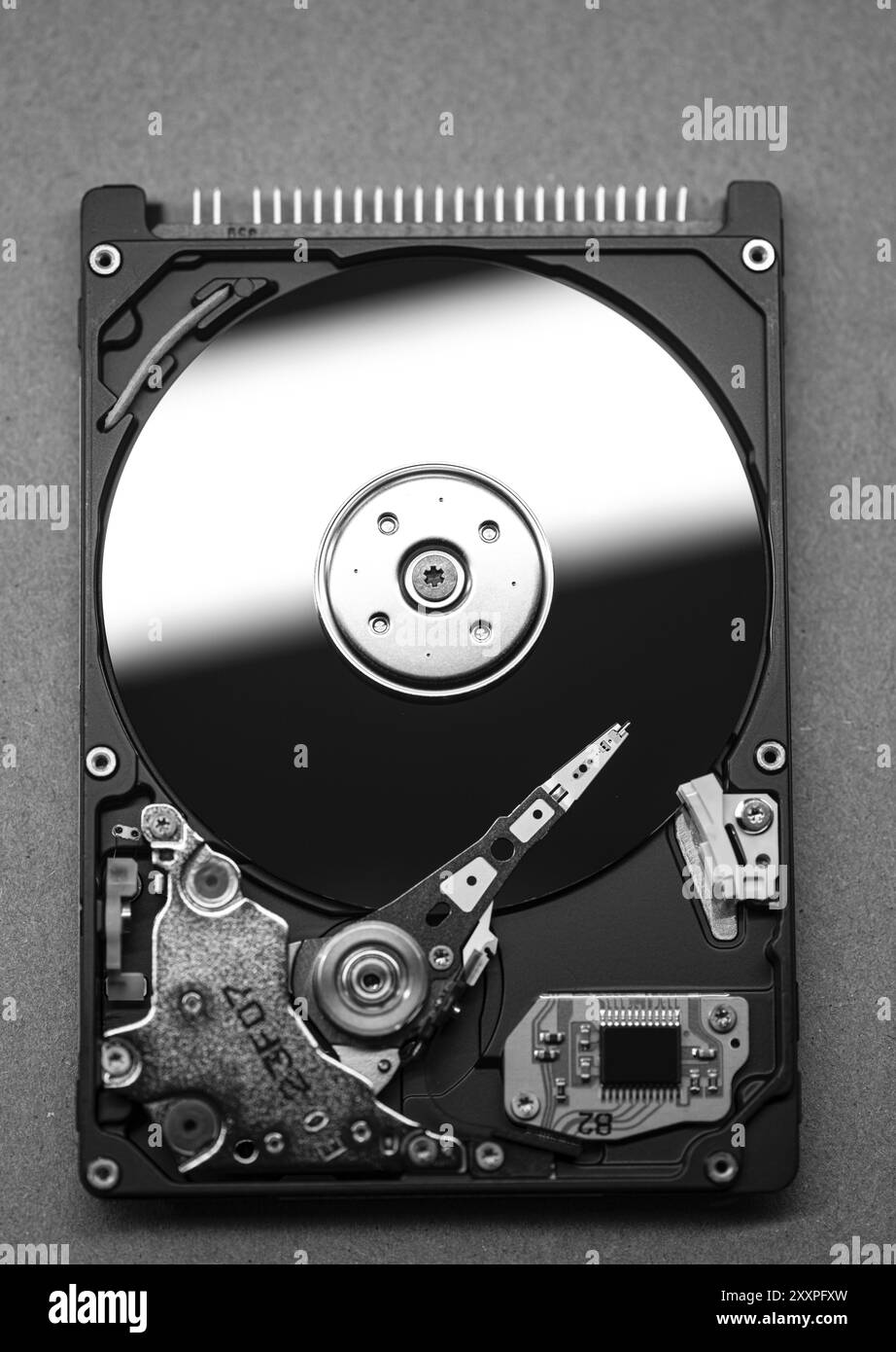 Mechanics inside a hard disk drive Stock Photo - Alamy