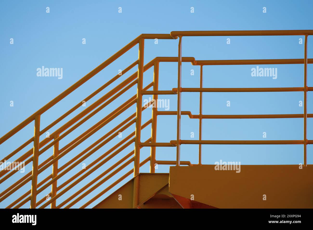 Yellow metal hand railings on a ferry Stock Photo - Alamy