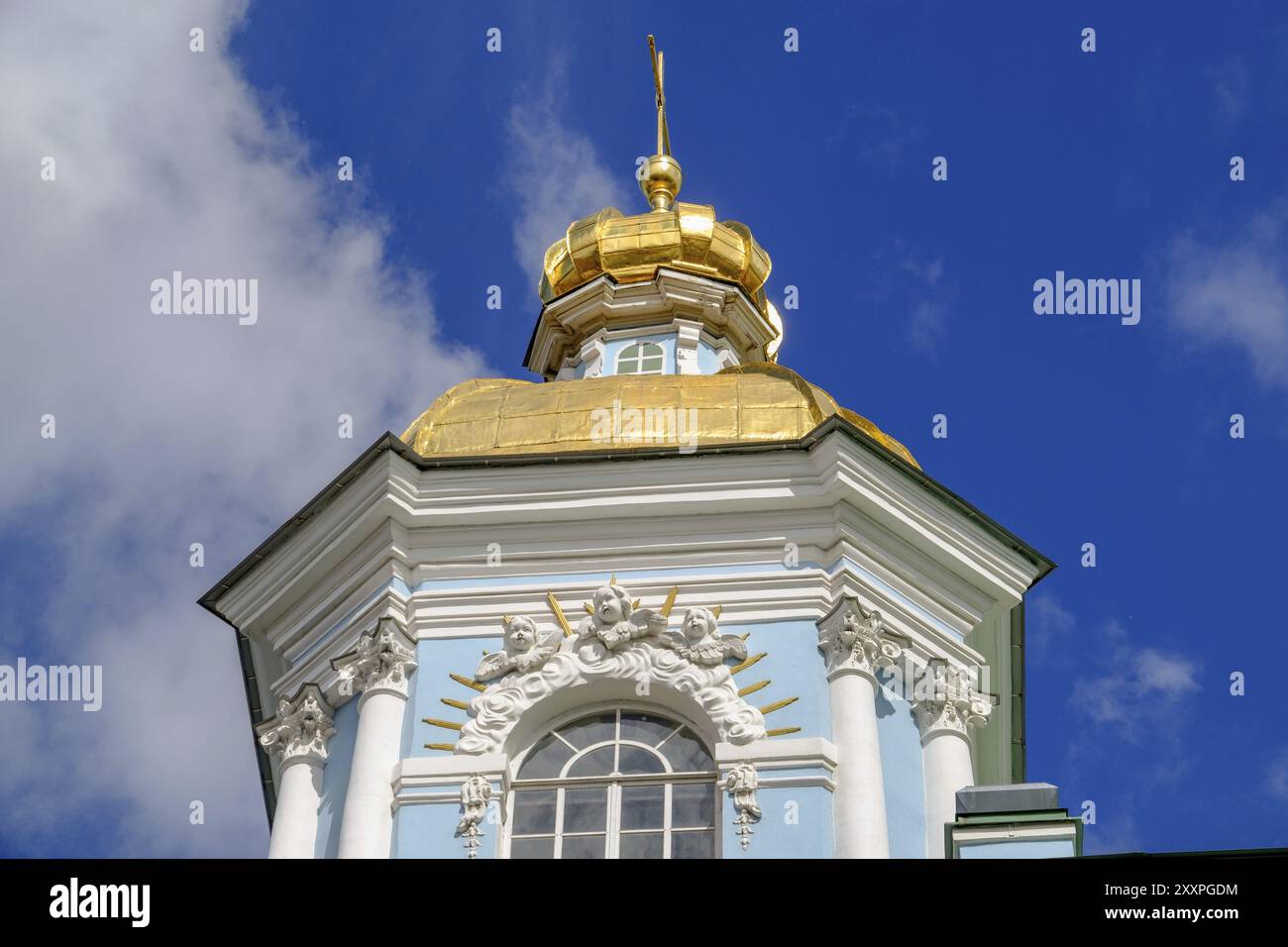 Gilded domed towers and filigree white decorations of baroque ...