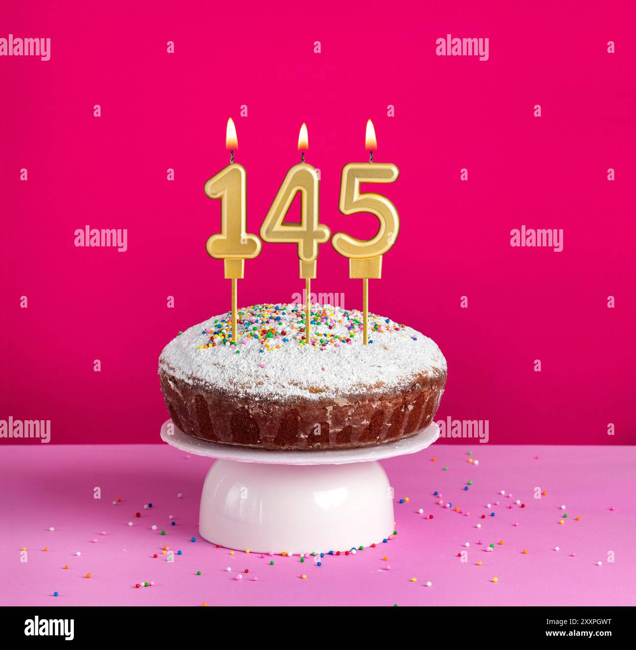 Birthday cake with number 145 candle on pink background Stock Photo - Alamy
