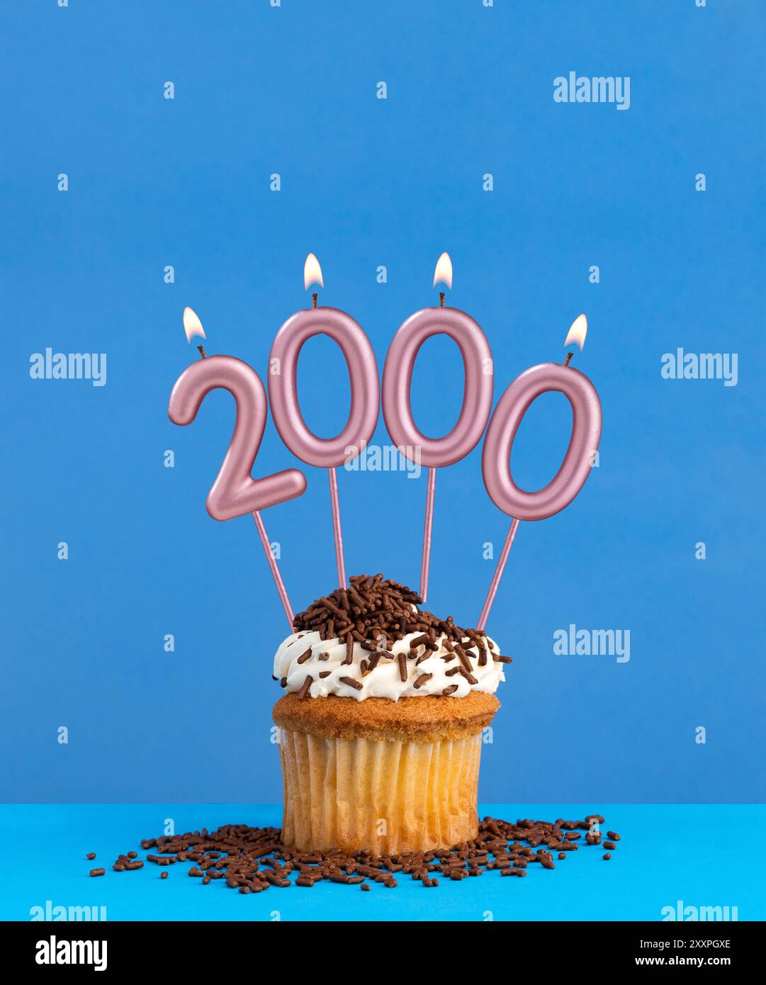 Candle number 2000 - Birthday card with cupcake on blue background Stock Photo - Alamy