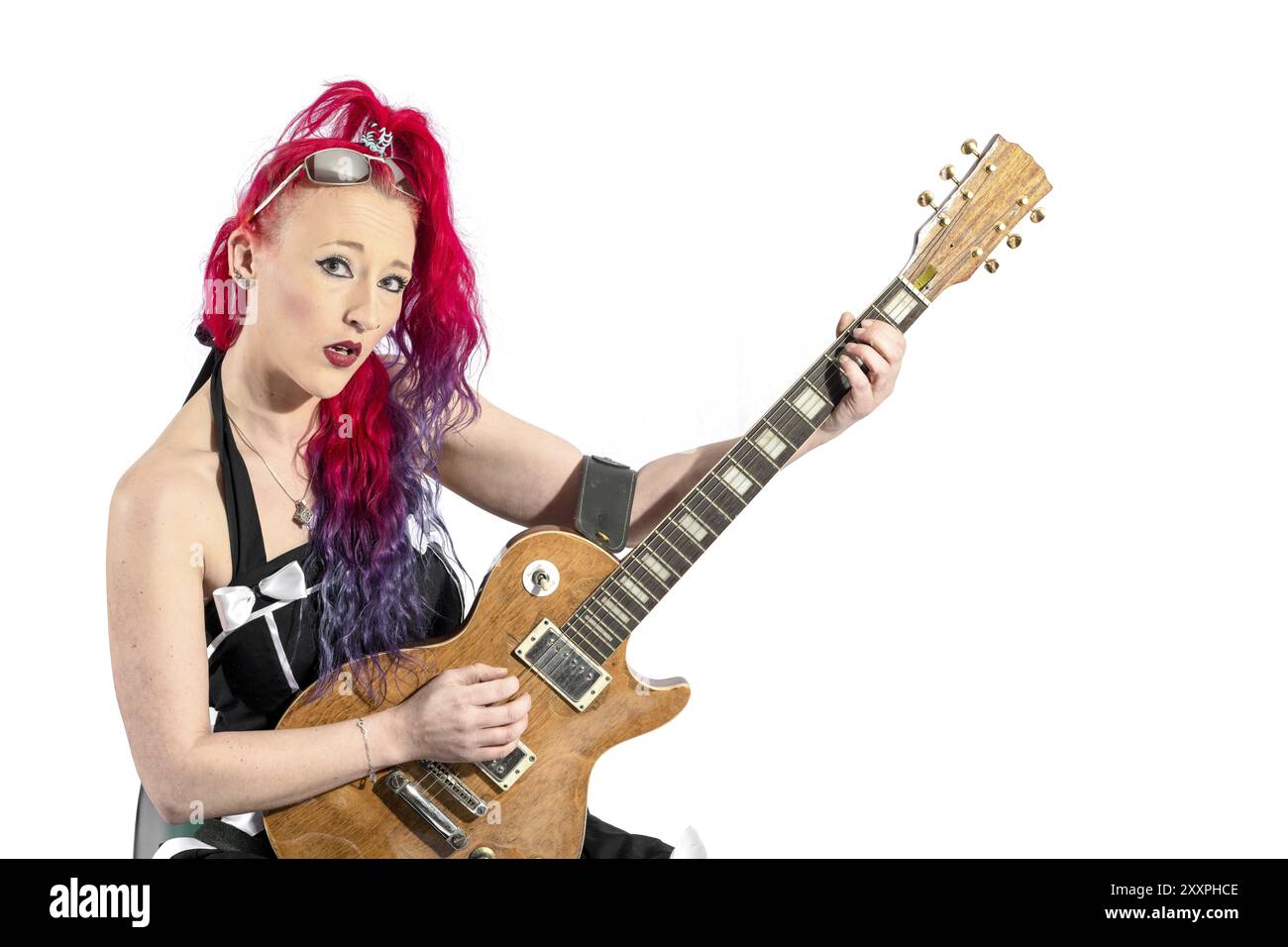 Rock'n'roll singer with red hair and guitar Stock Photo - Alamy