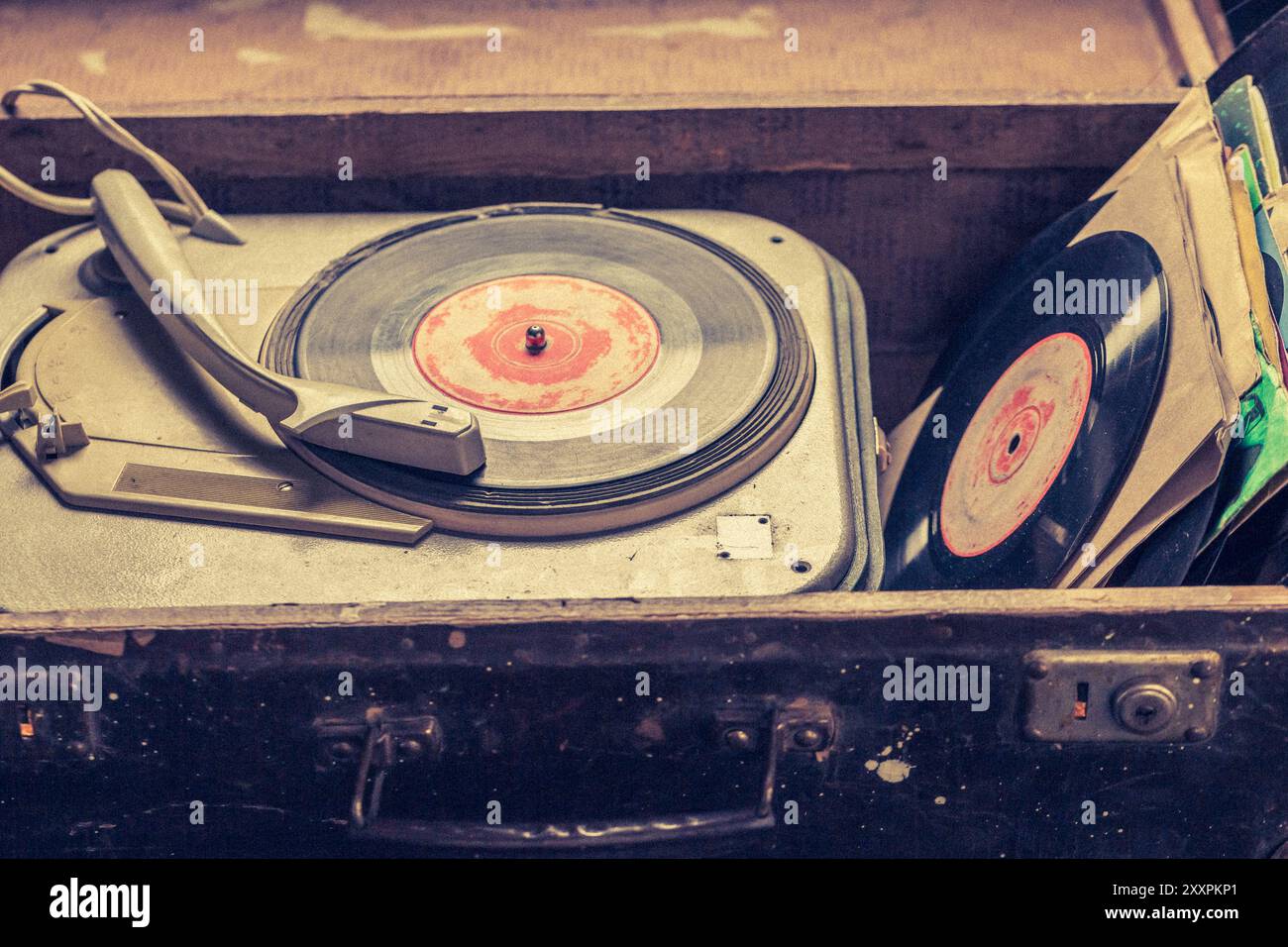 Portable gramophone as listening to music in the 70s. Turntable and ...