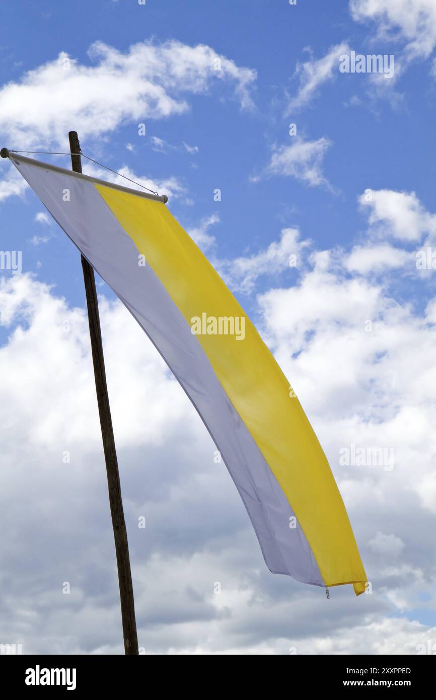 Waving church flag with blue sky Stock Photo - Alamy