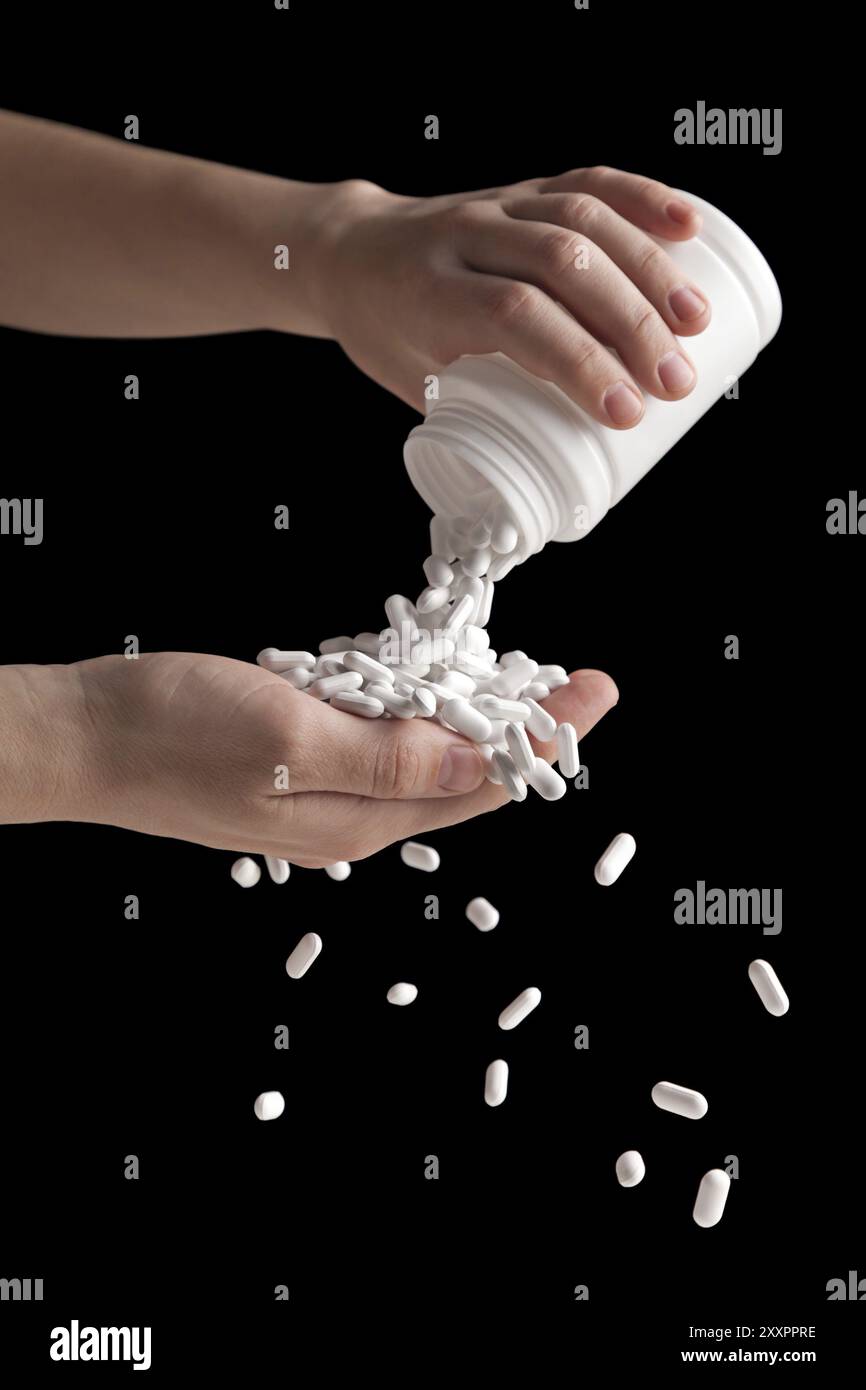 Human hand spill medicine healthcare vitamin pill Stock Photo - Alamy
