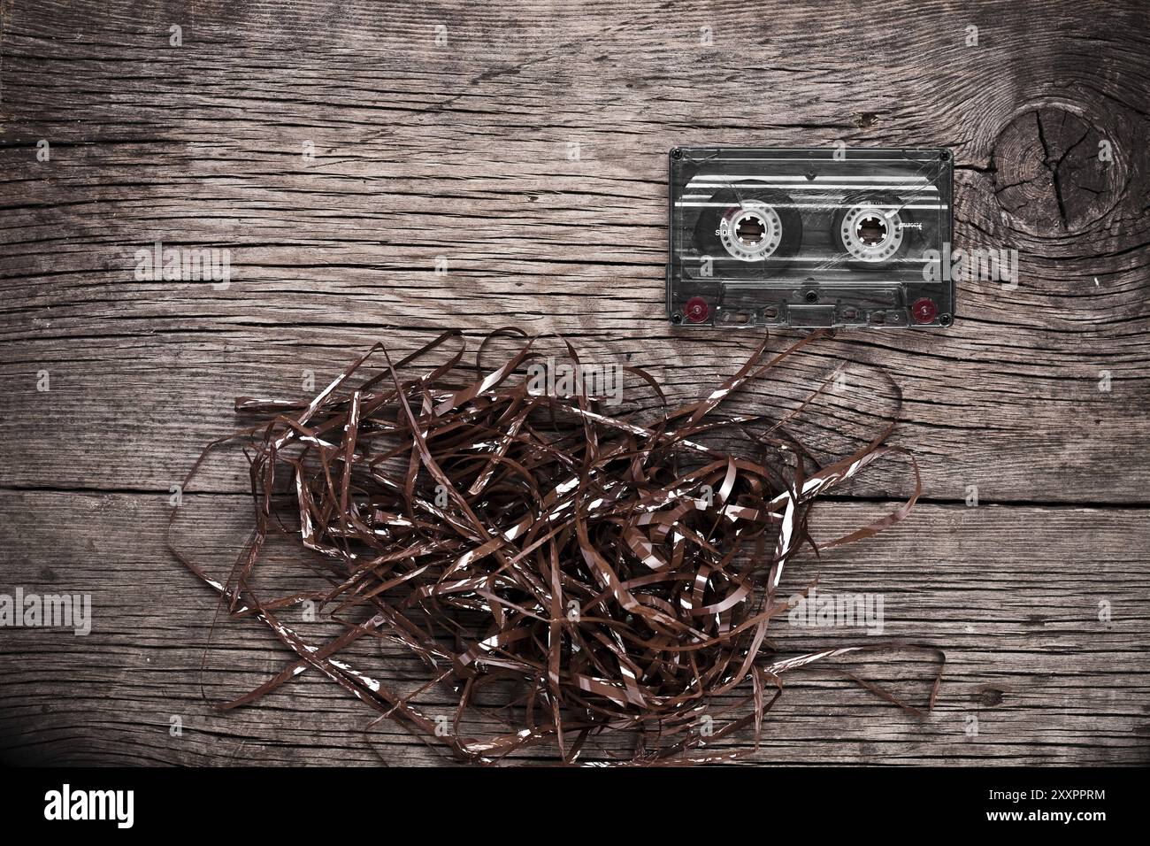 Retro cassette on wooden texture. Abstract background Stock Photo - Alamy