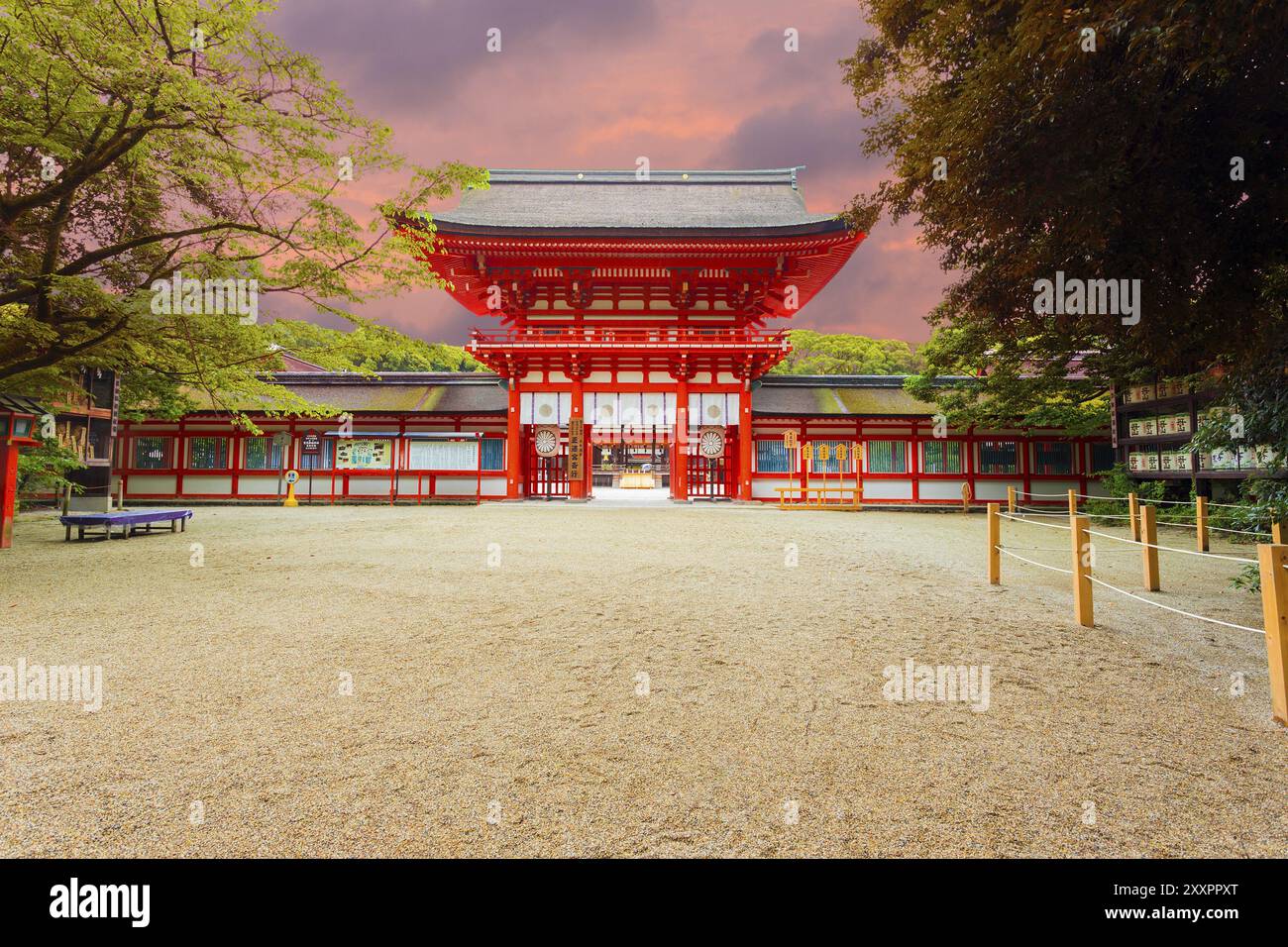 Front entrance tower gate and open door to Shimogamo Shrine, centered ...