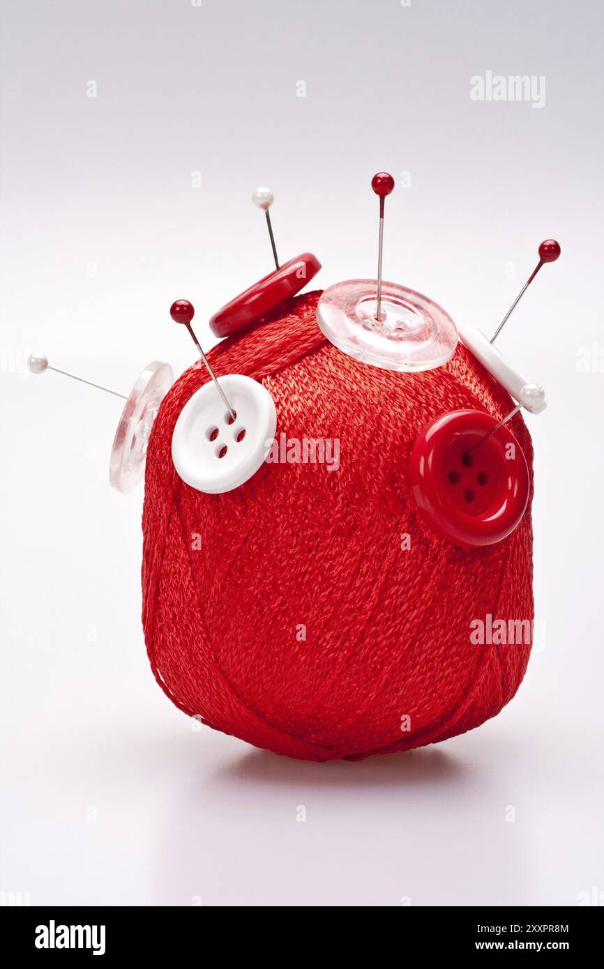 Red ball of wool hi-res stock photography and images - Alamy