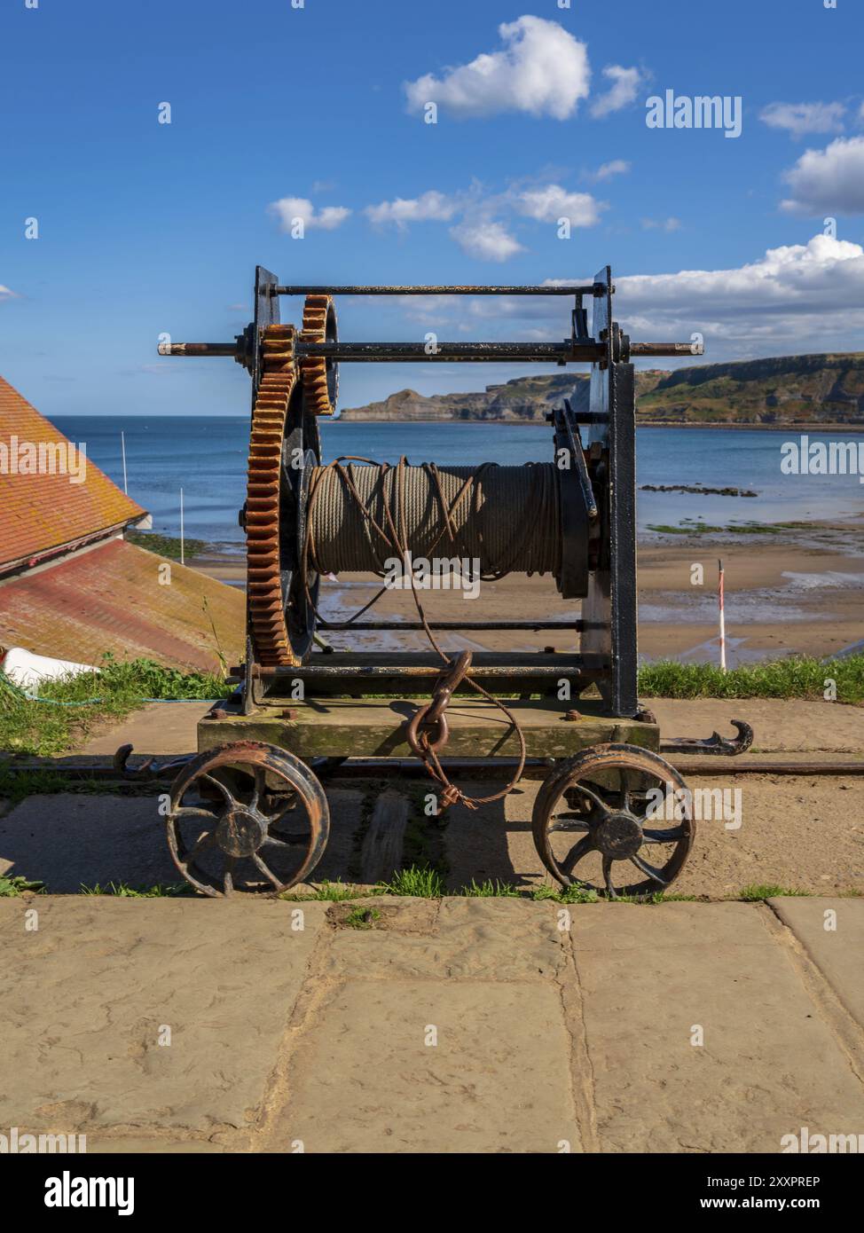 An old rope winch on the North Sea coast in Runswick Bay, North ...
