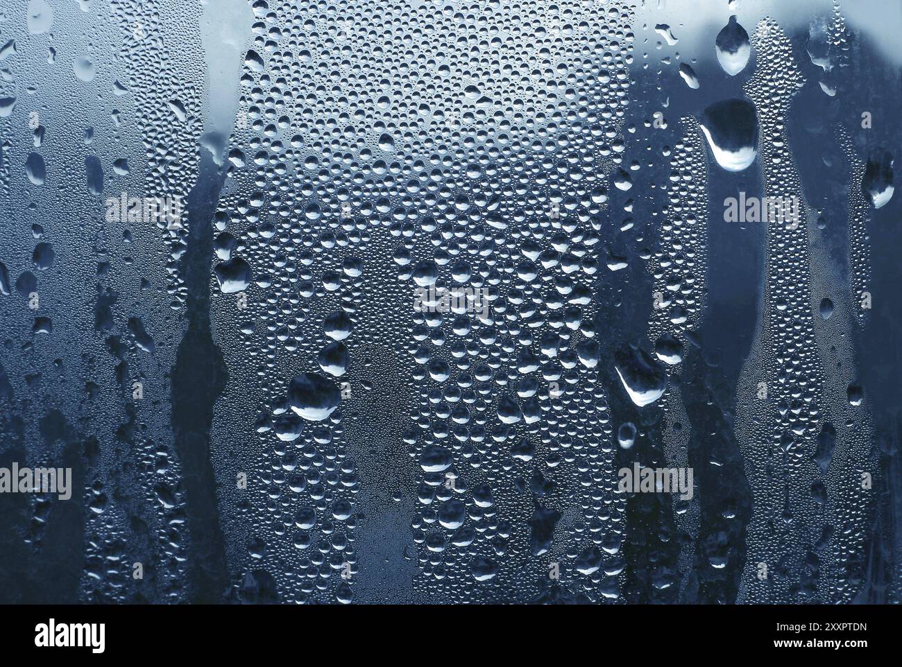 Large and fine water drops on glass Stock Photo - Alamy