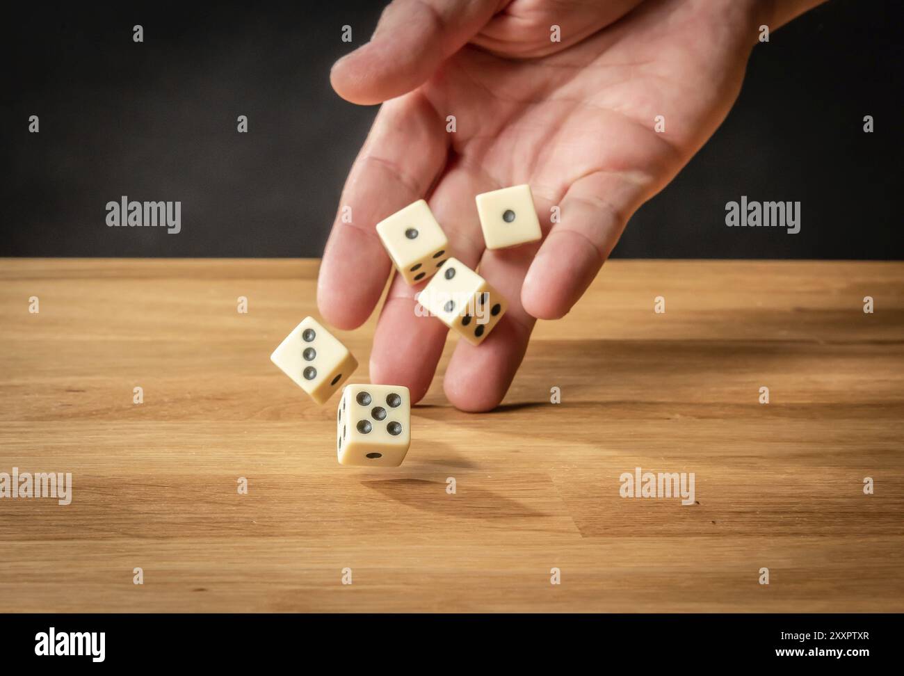 Throwing a dice hi-res stock photography and images - Alamy