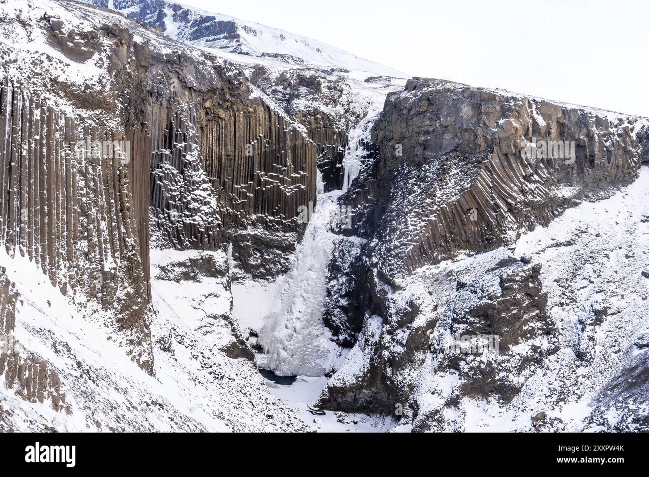 Hengifoss waterfall frozen in cold hi-res stock photography and images ...
