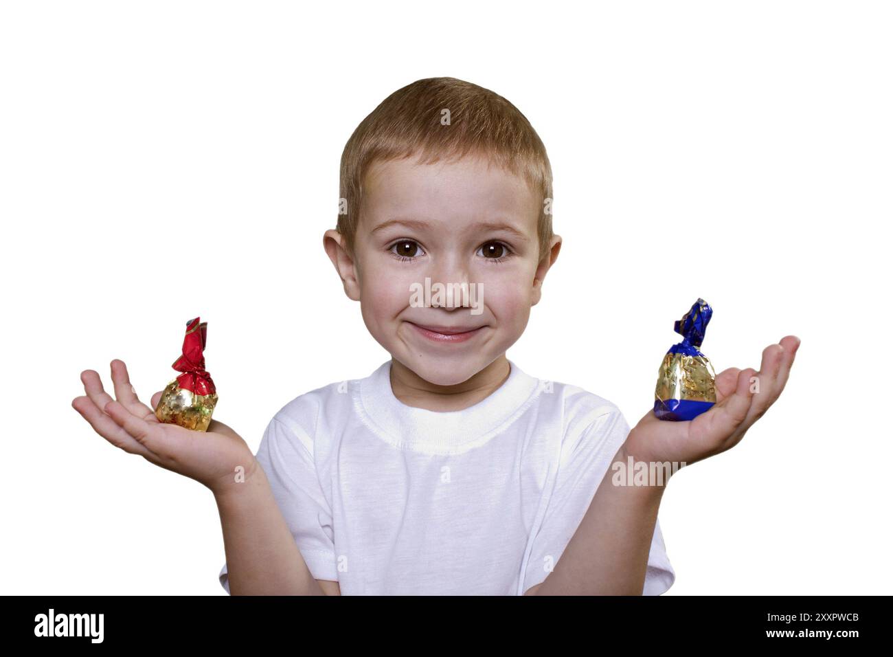 Human hand holding two sweet chocolate candy food Stock Photo - Alamy
