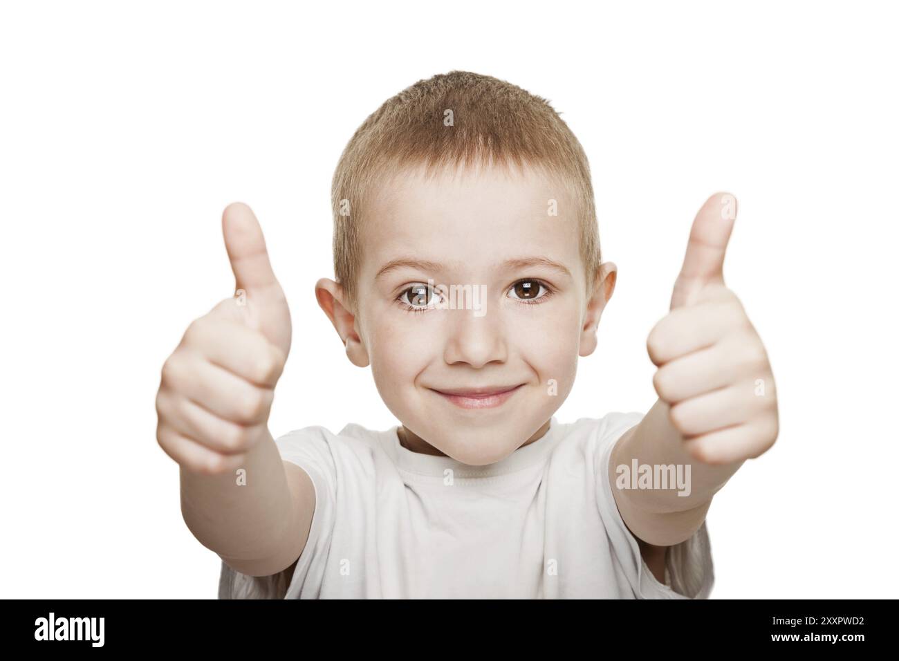 Human child hand gesturing thumb up success sign Stock Photo - Alamy