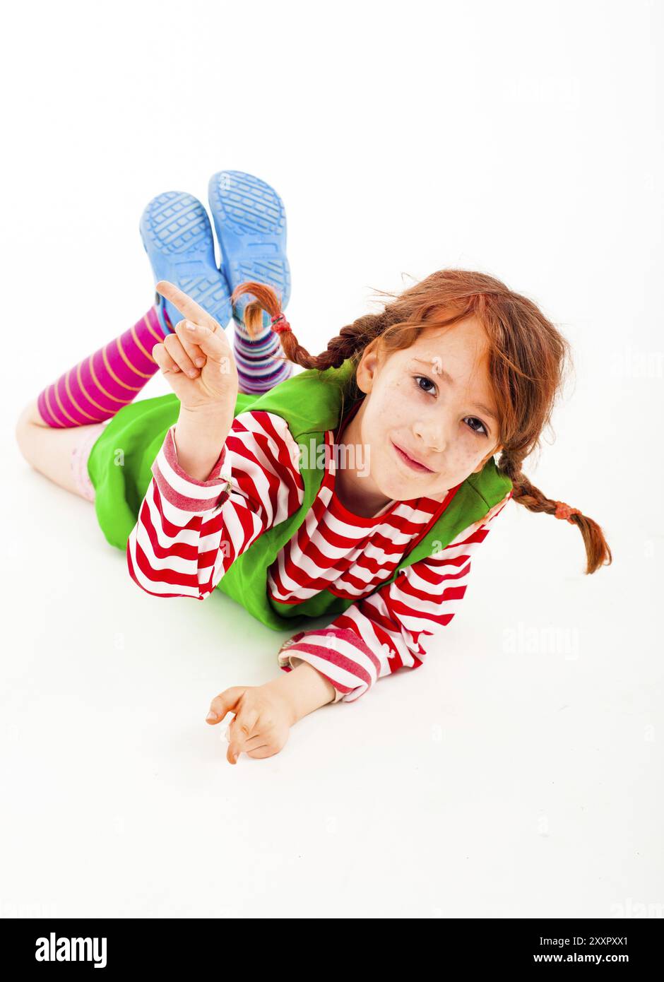 Little girl dressed as Pippi Longstocking with white background Stock ...