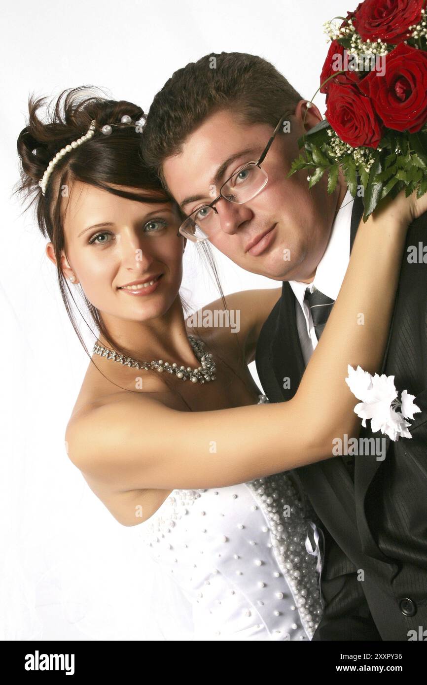 Newly married together in a photo pose Stock Photo - Alamy