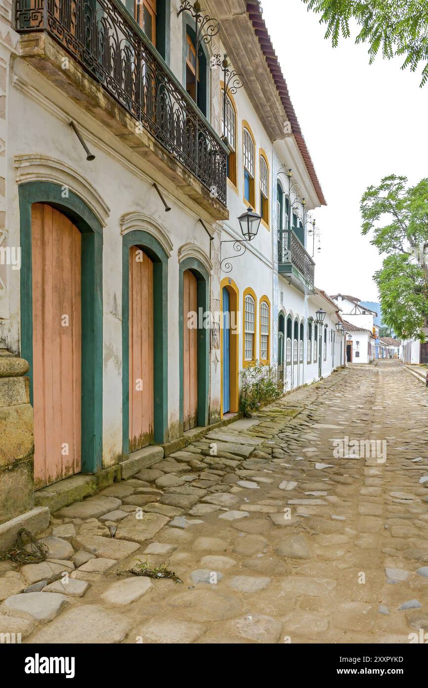 Street with old houses in colonial style with the traditional ...