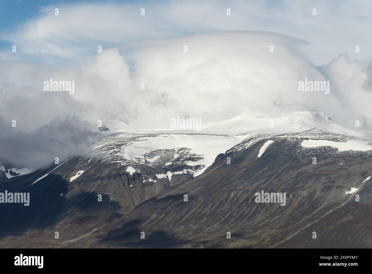 Cloudy mood over the Laddjuvaggi valley and the highest mountain in ...
