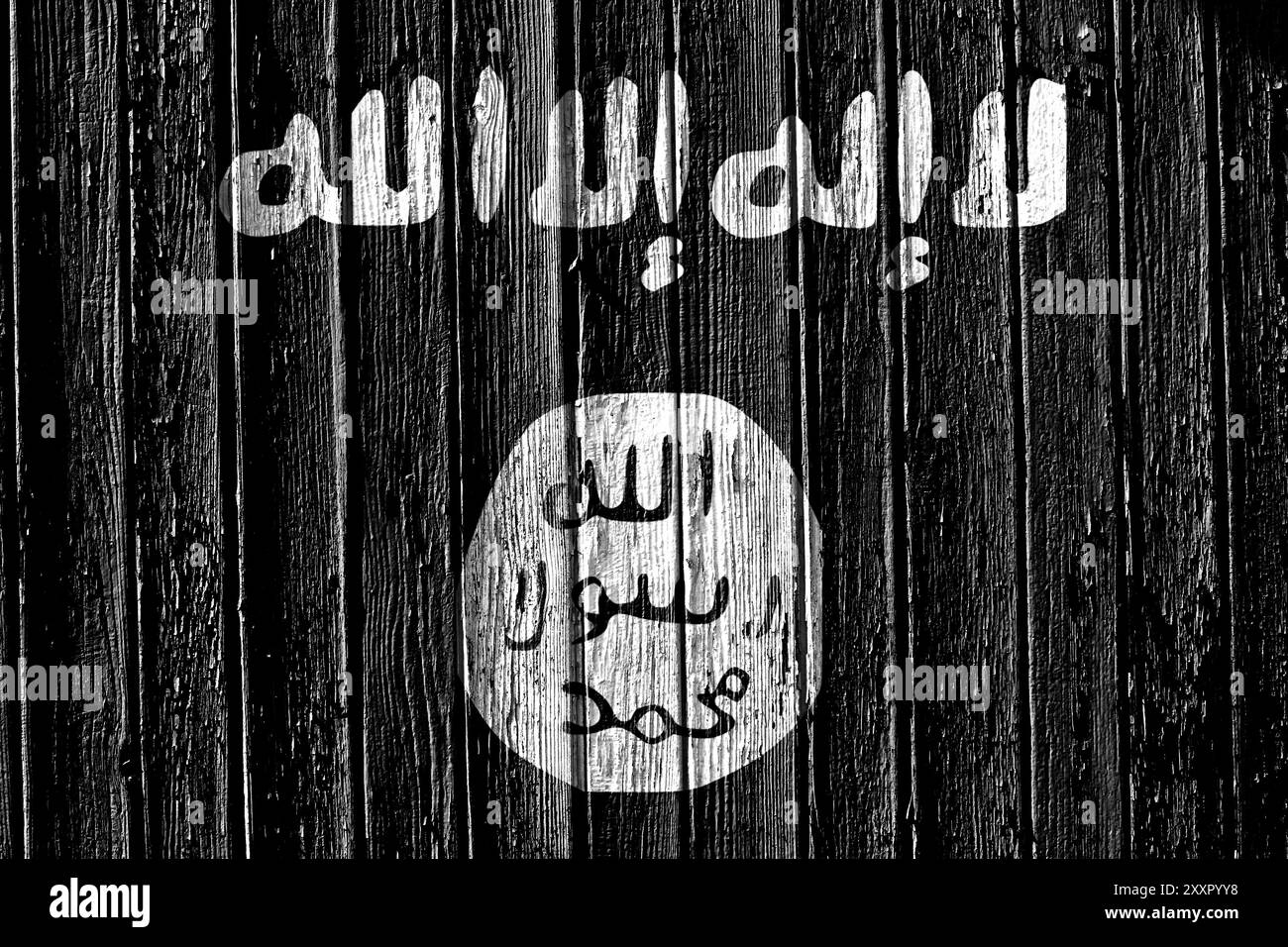 Flag of Islamic State of Iraq and the Levant painted on wooden frame ...
