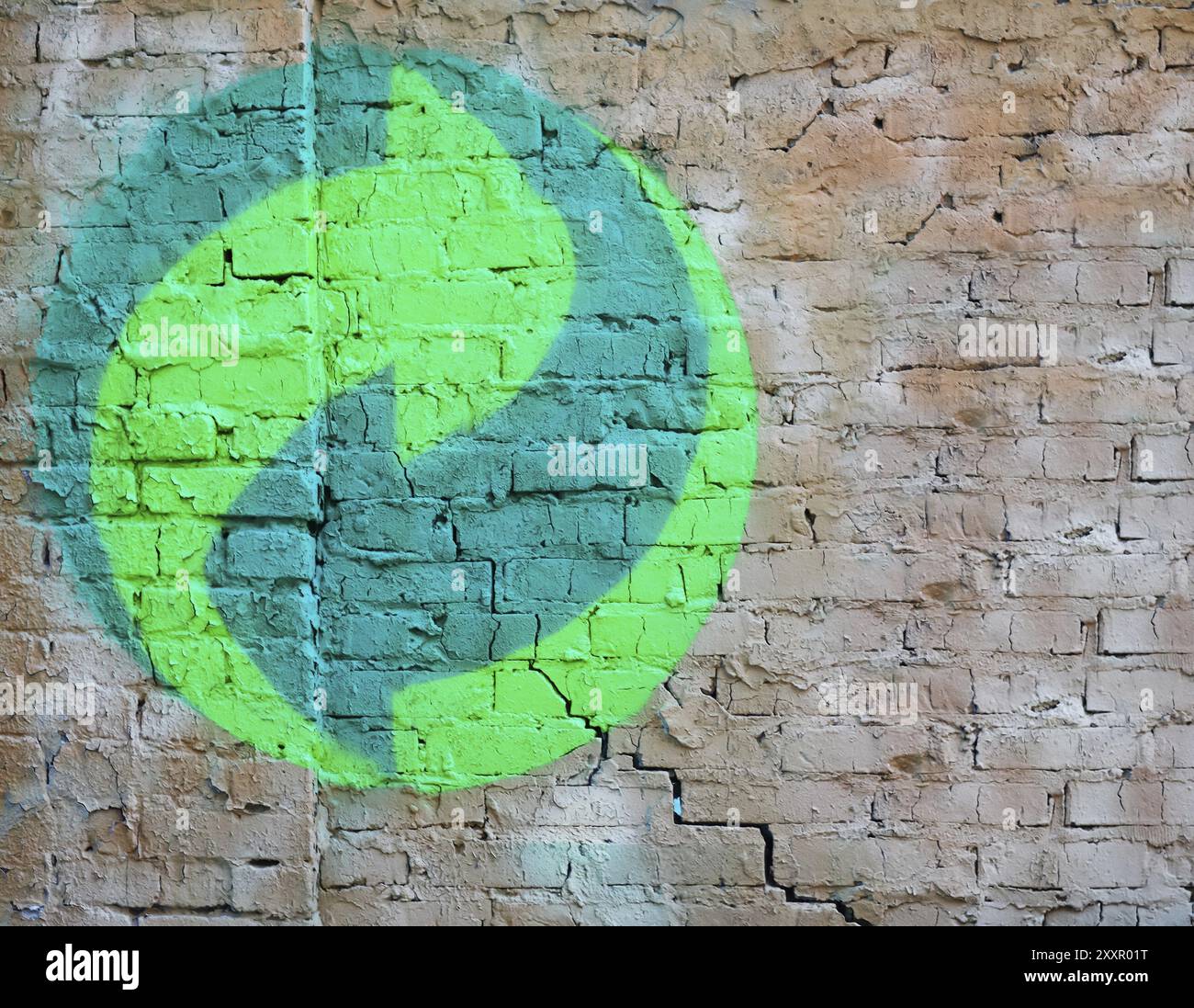 Green eco sign on the brick wall, Concept, Go green Stock Photo - Alamy