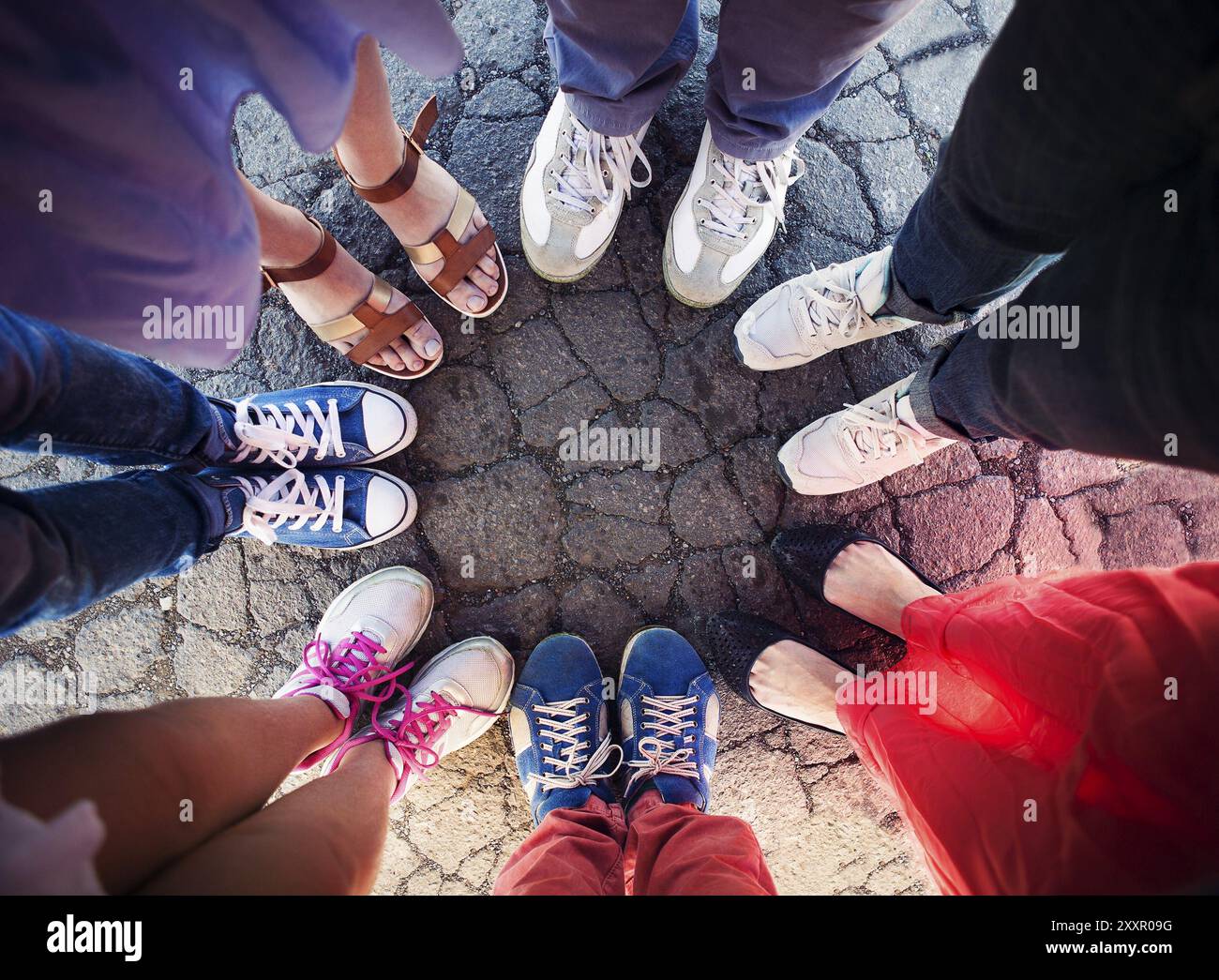 Group of friends with their legs in a complete circle. Friendship ...