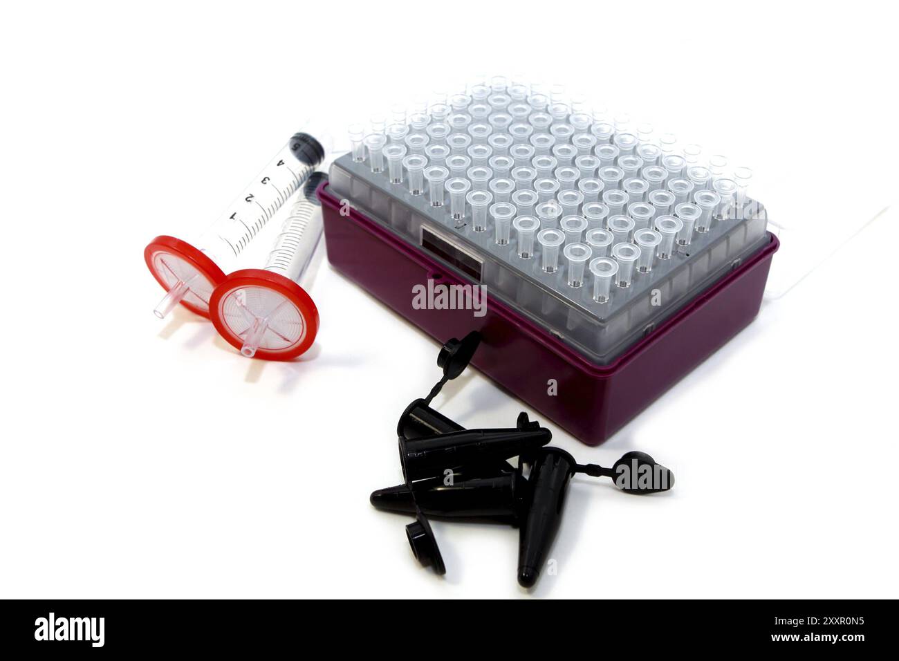 Laboratory tubes, tips and filters on white background Stock Photo - Alamy