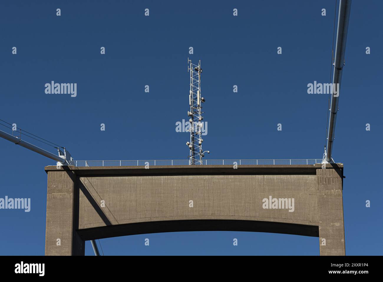 Communications pylon on the top of a suspension bridge tower Stock ...