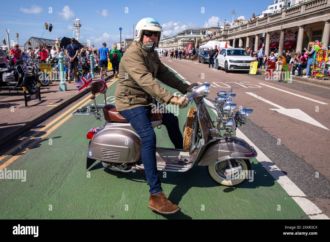 A Mod rides a scooter. Thousands attend the annual Mod Weekender held ...