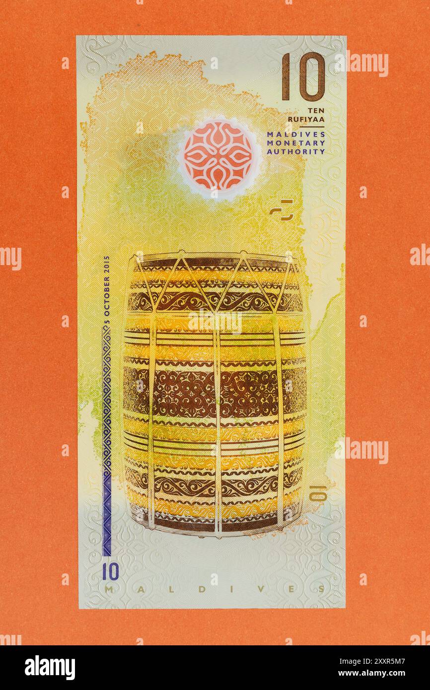 Maldives 10 rufiyaa yellow-brown color vertical banknote with ...