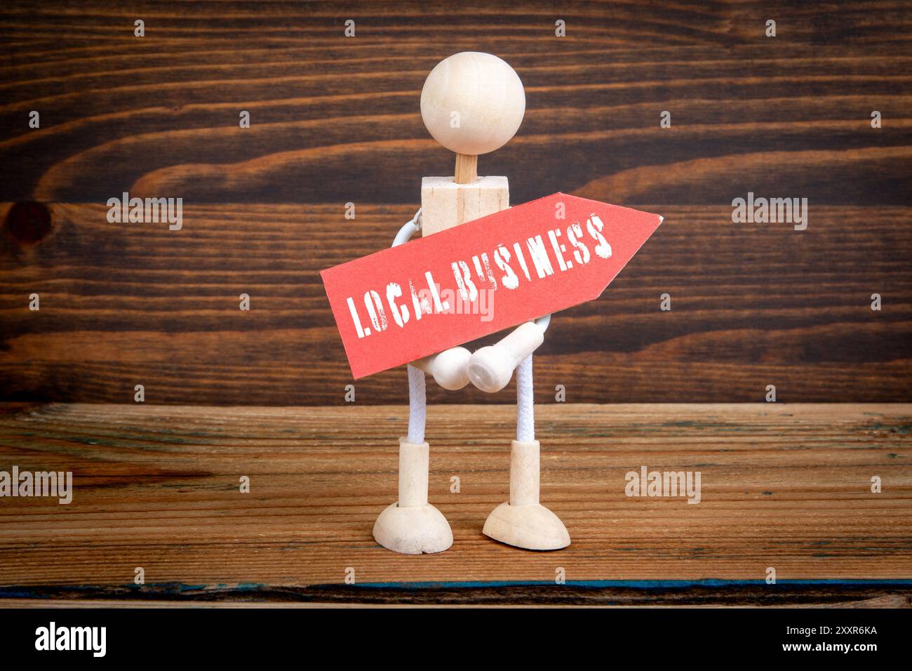 Local Business. Red pointing arrow with text. Miniature human figures ...