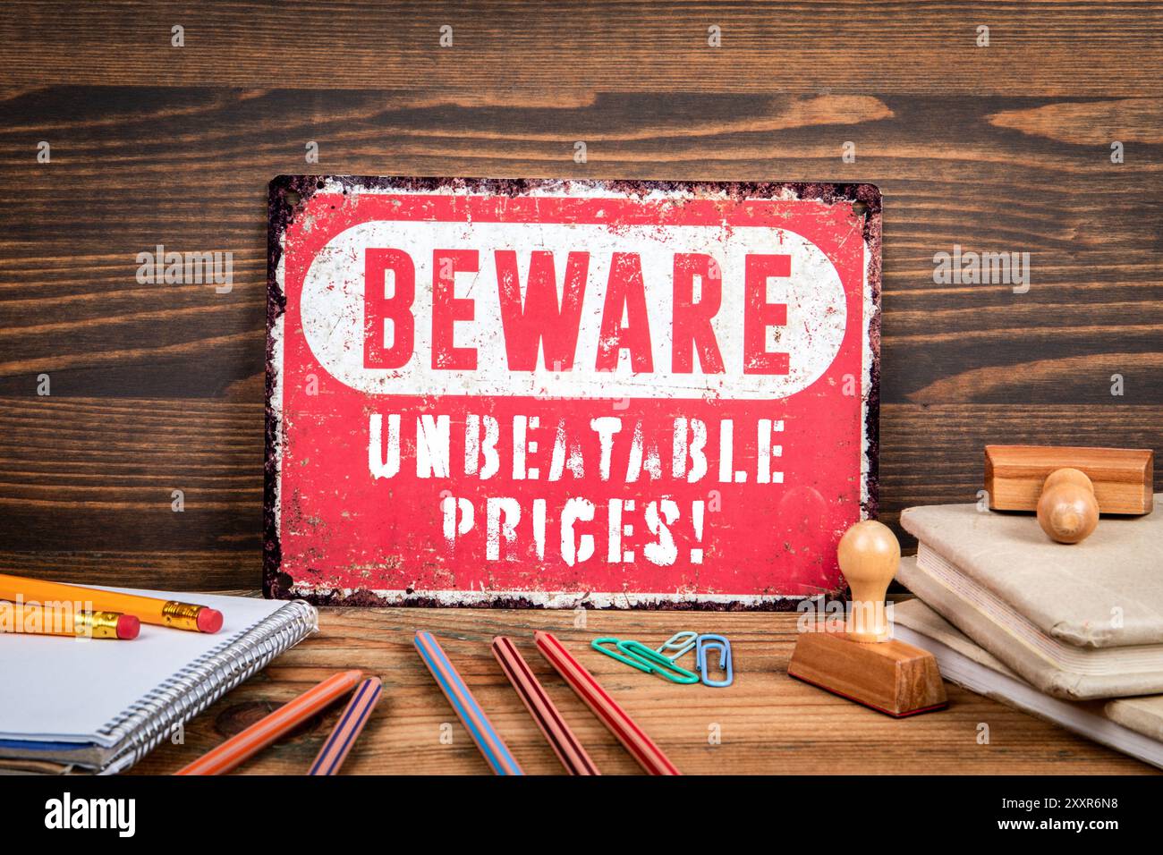 Unbeatable Prices. Beware sign with text on a wooden texture office ...