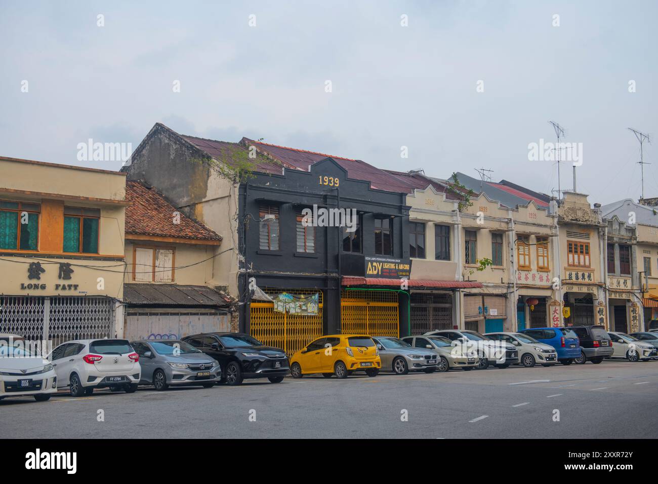 Historic commercial buildings on Jalan Kampung Pantai Street in ...