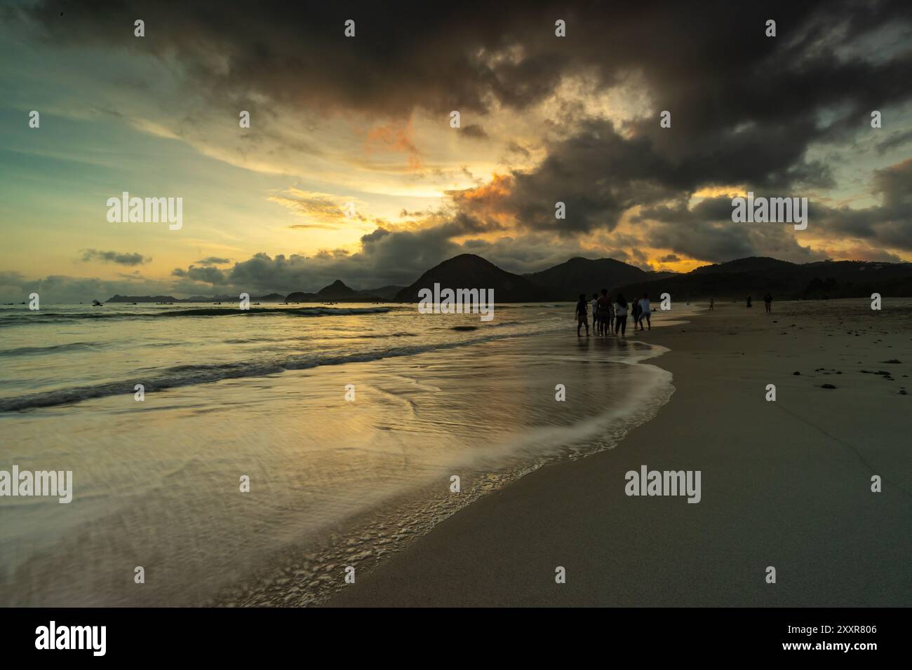 Buffalo walk at Selong Belanak beach Stock Photo - Alamy