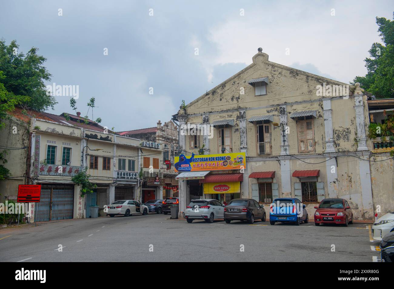 Historic commercial buildings on Jalan Kampung Pantai Street in ...