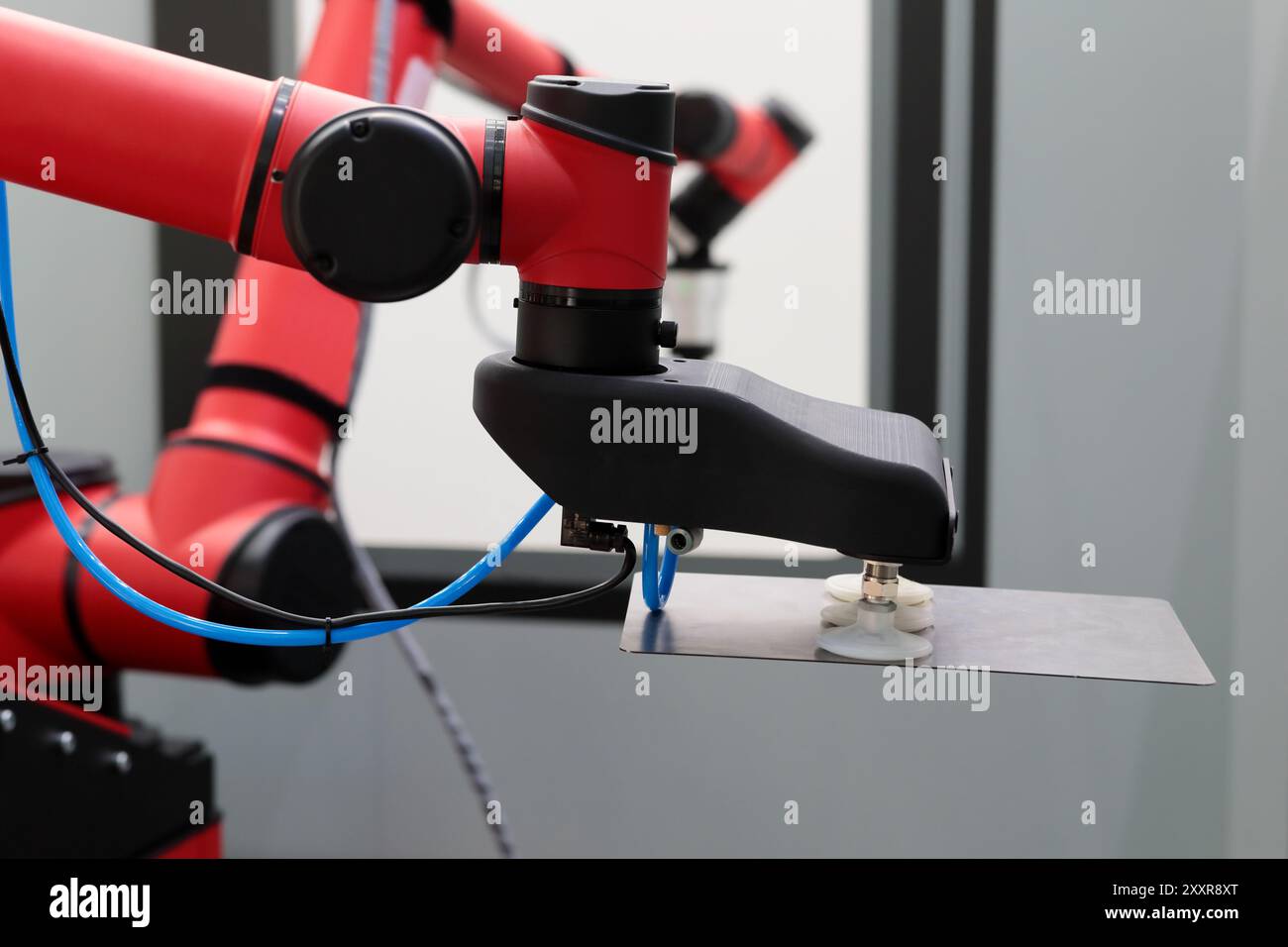 Industrial robotic manipulators on production line for an automated ...