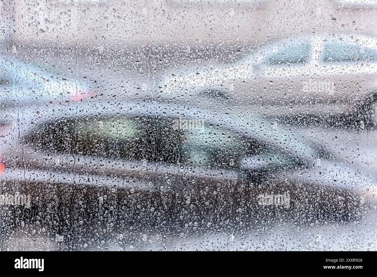 car traffic in heavy rainy weather. rainy droplets on a window glass Stock Photo - Alamy
