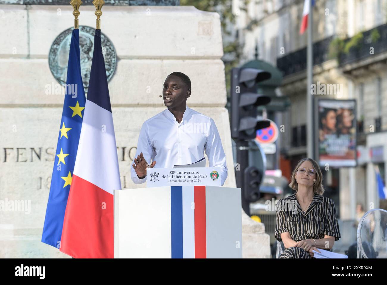 Birane Ba delivers his speech, as US actor Jodie Foster looks on, at a ...