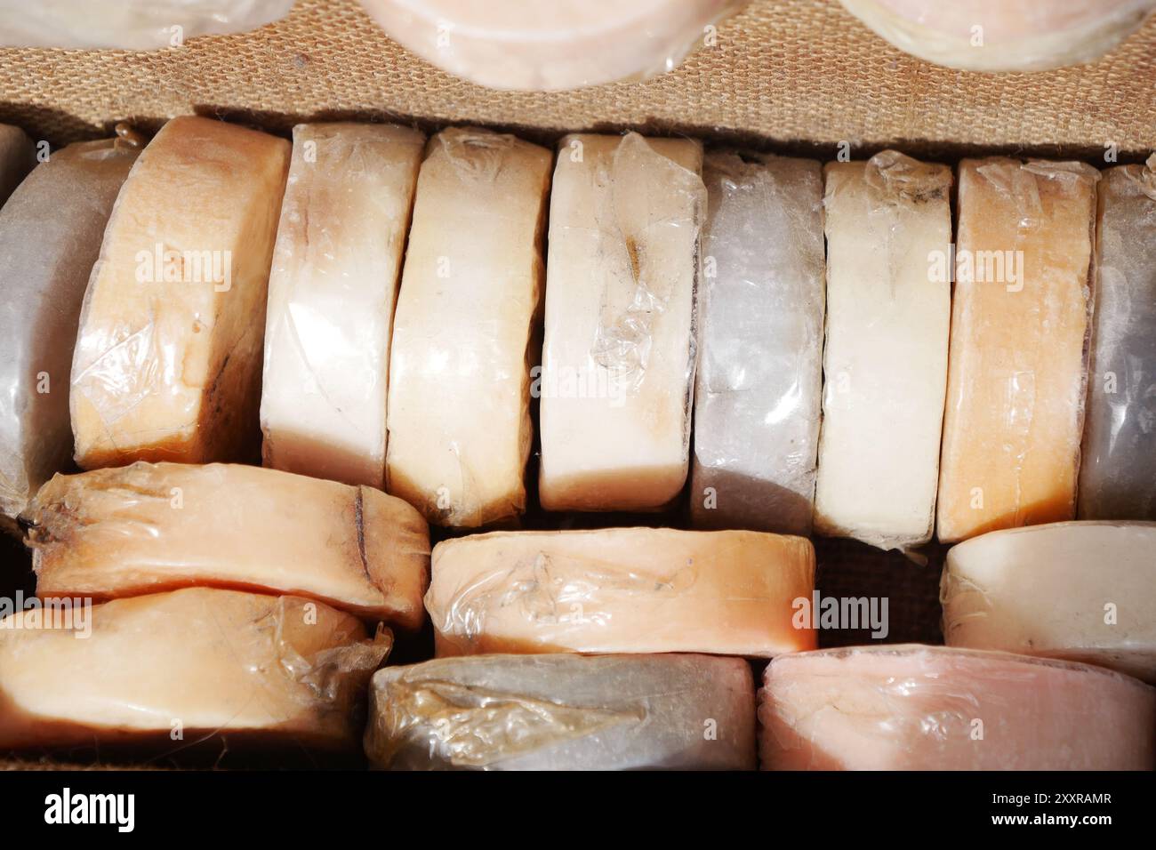 A delightful selection of assorted natural soap bars, featuring vibrant ...