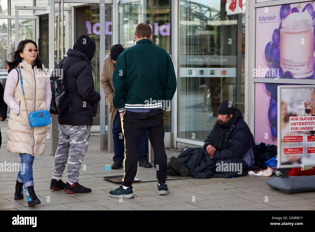 Cologne, Germany. February 01, 2024. A homeless man in front of the ...