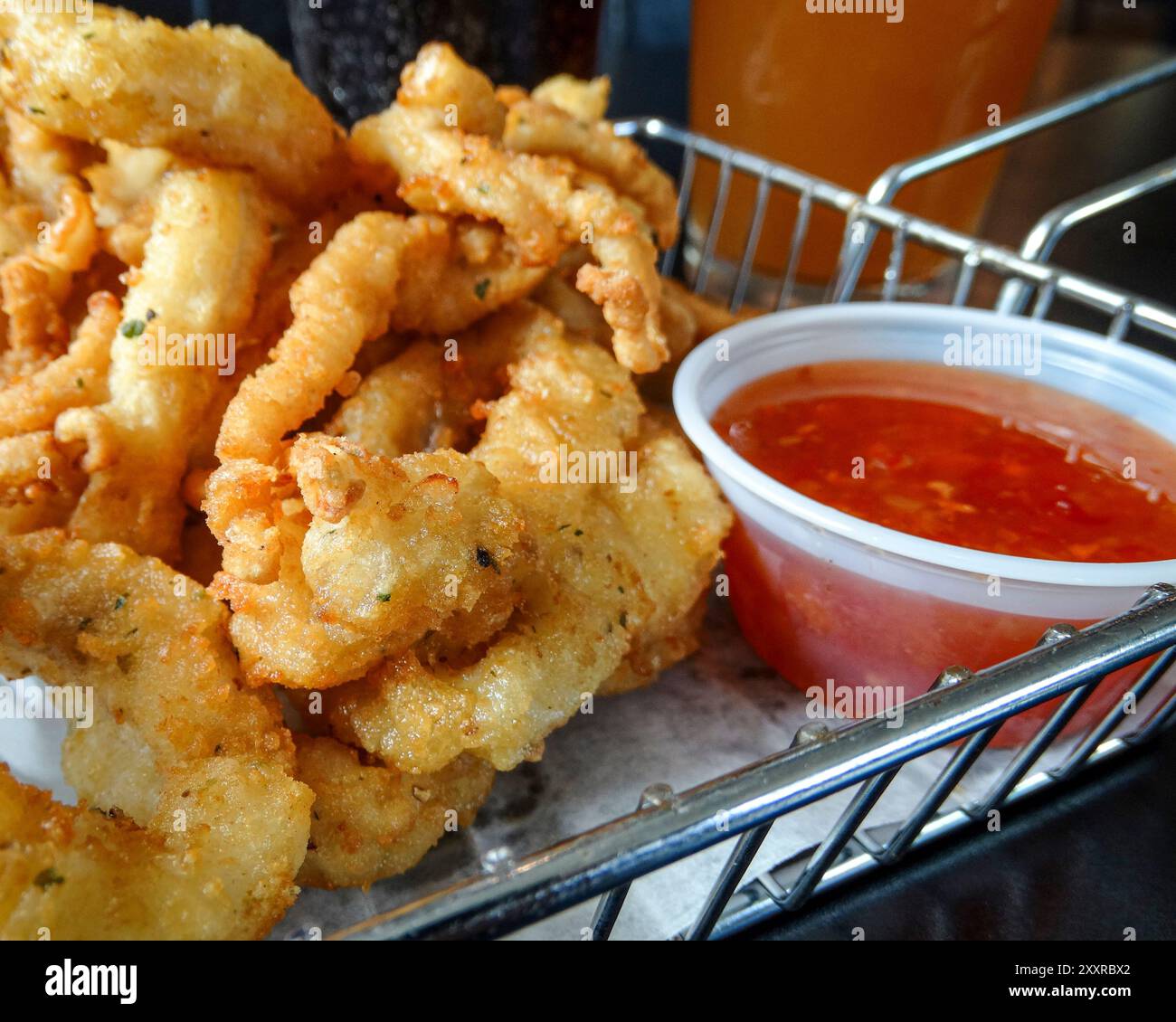 Deep fried calamari at a restaurant Stock Photo - Alamy
