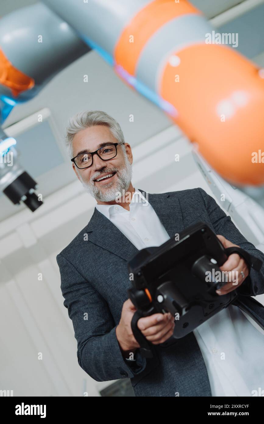 Automation, robotics engineer working on robotic knee replacement ...