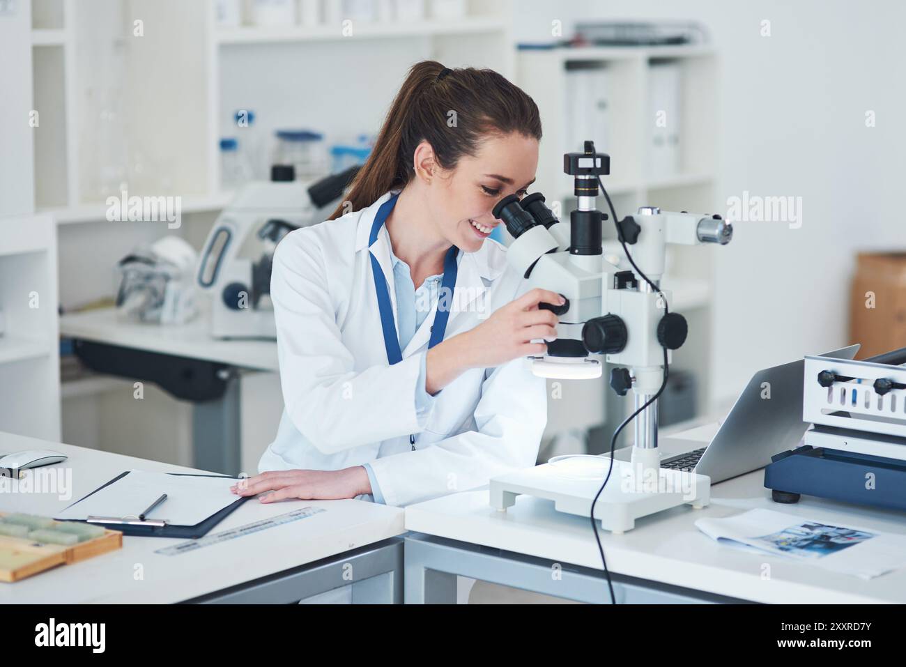 Microscope, scientist and results in science lab for medicine, biology ...