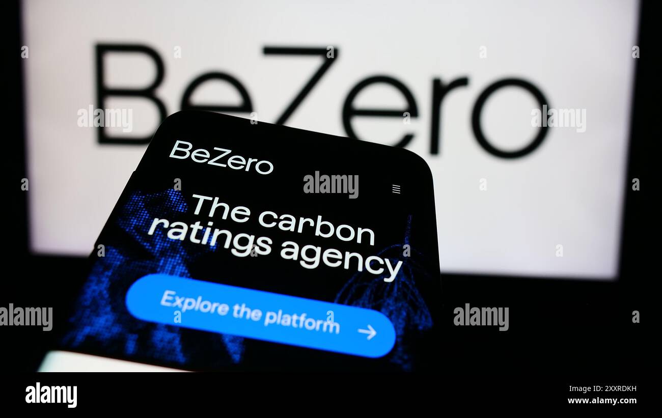 Mobile phone with website of British ratings company BeZero Carbon Ltd ...