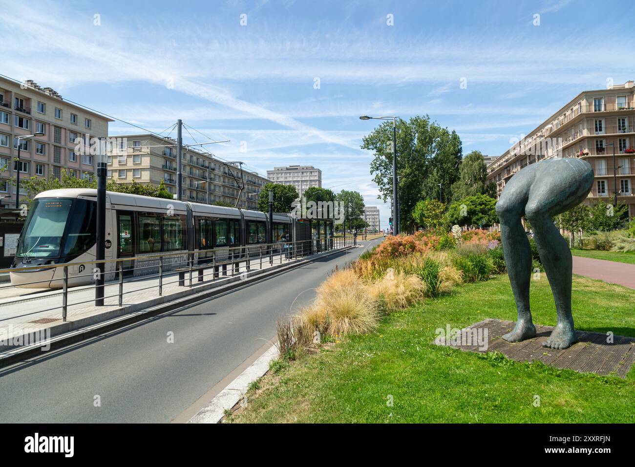 "PLEASE" Legs sculpture by the Dutch artist Henk Visch with a tram in ...